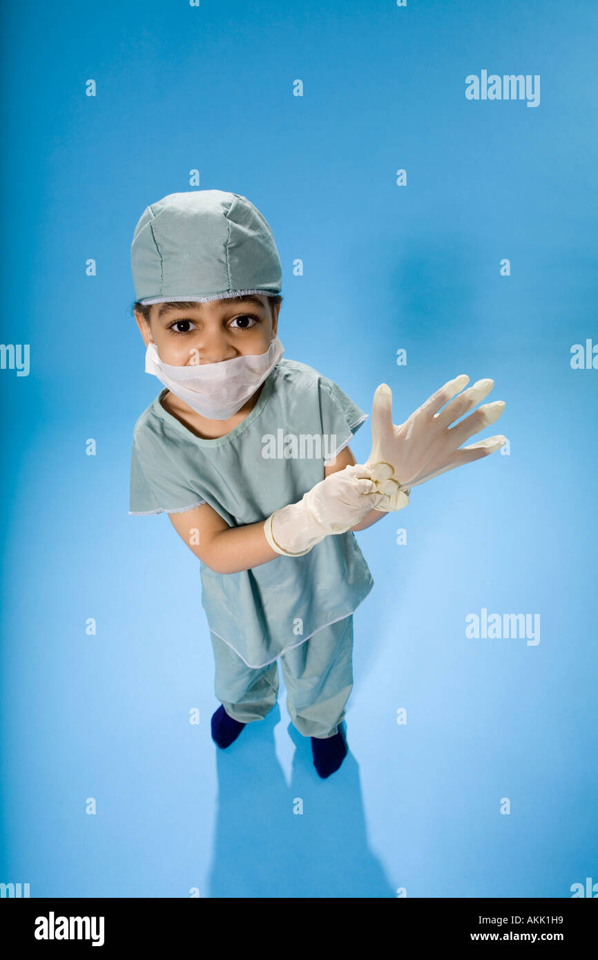 High angle portrait of young boy dressed in scrubs Stock Photo - Alamy