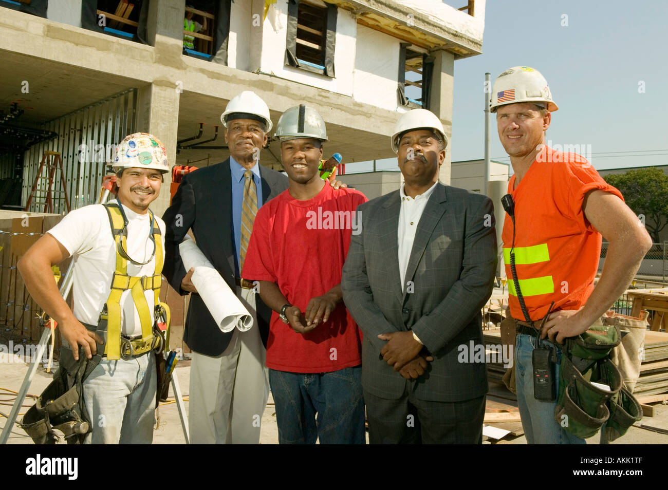 Group portrait of men at construction site Stock Photo - Alamy
