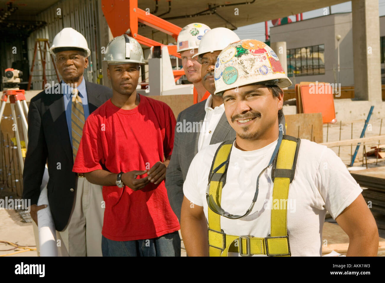 Group portrait of men at construction site Stock Photo - Alamy