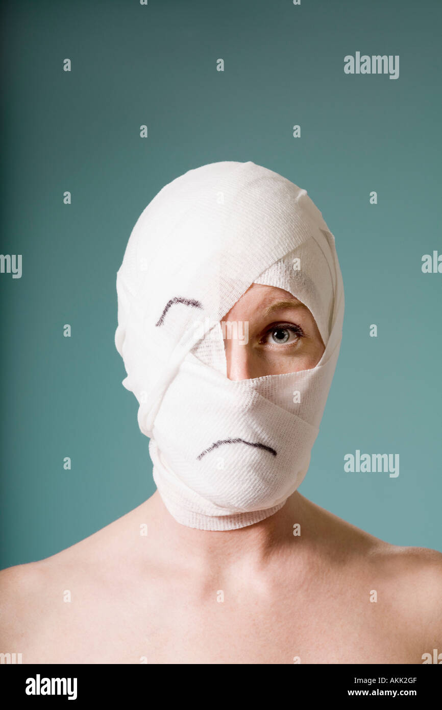 Woman head wrapped in bandage hi-res stock photography and images - Alamy
