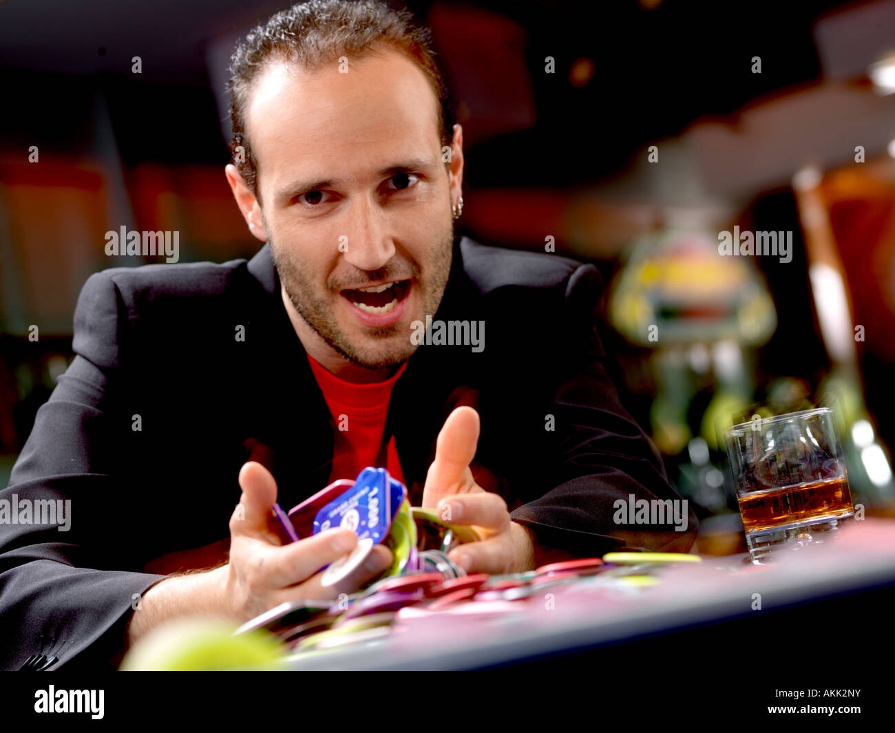 man in casino Stock Photo - Alamy
