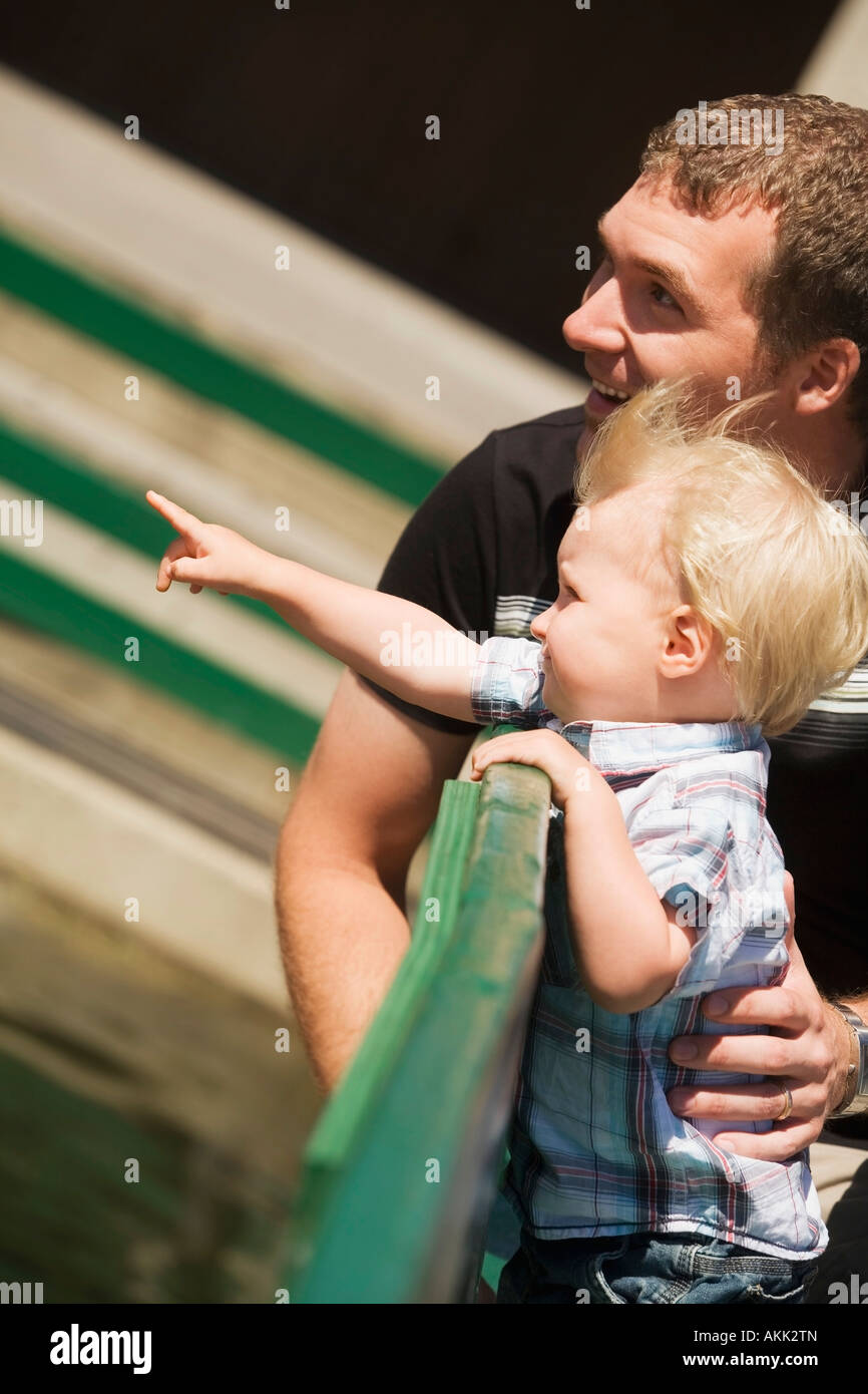Side view of father with son Stock Photo - Alamy