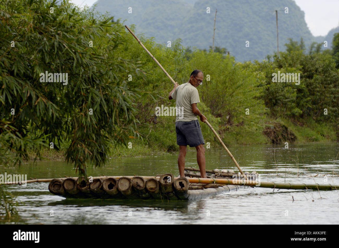 Balancing man raft rural trees hi-res stock photography and images - Alamy