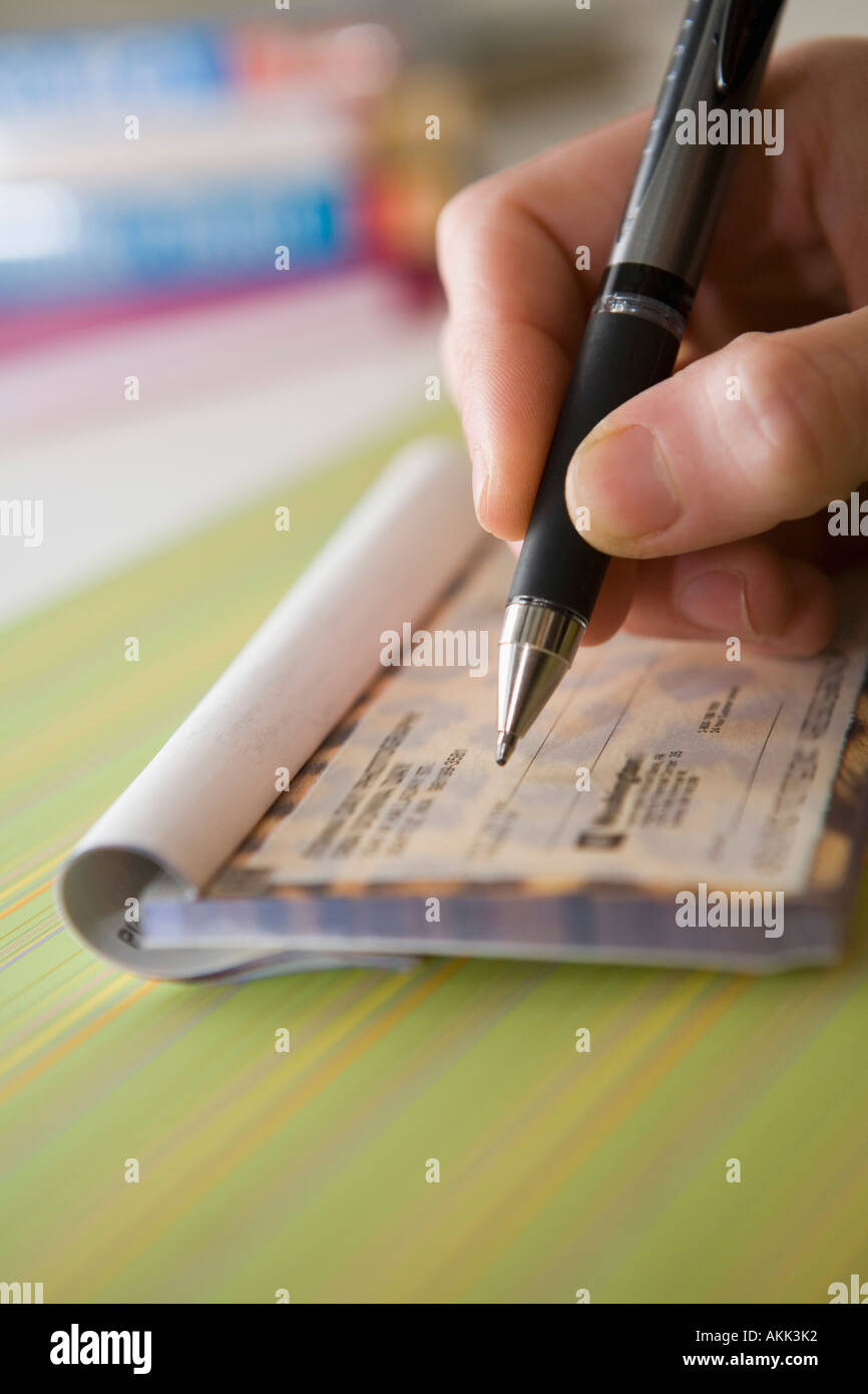 Checkbook hi-res stock photography and images - Alamy