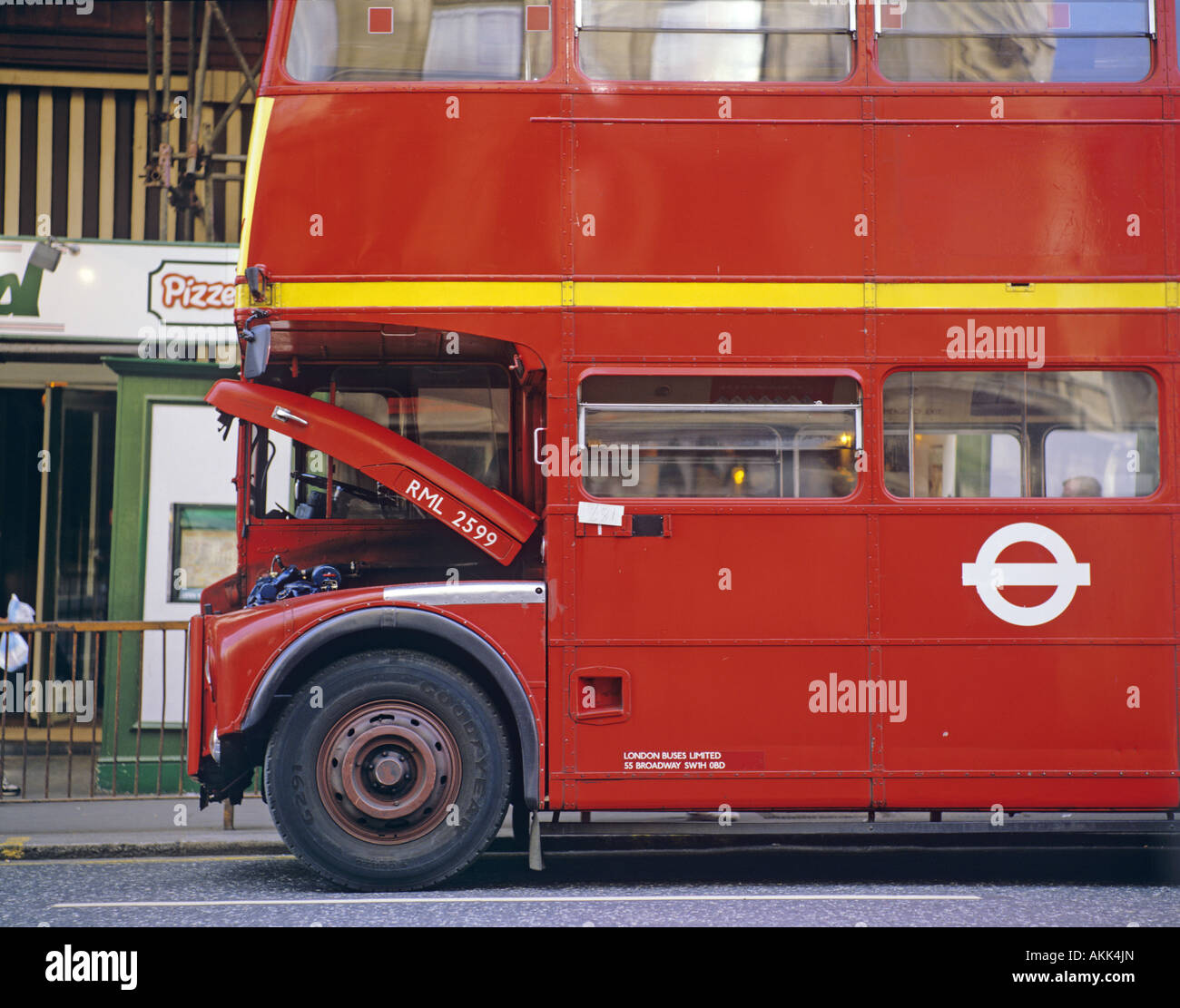 A Double Decker Bus with a Bonnet Open Haymarket London England Stock ...