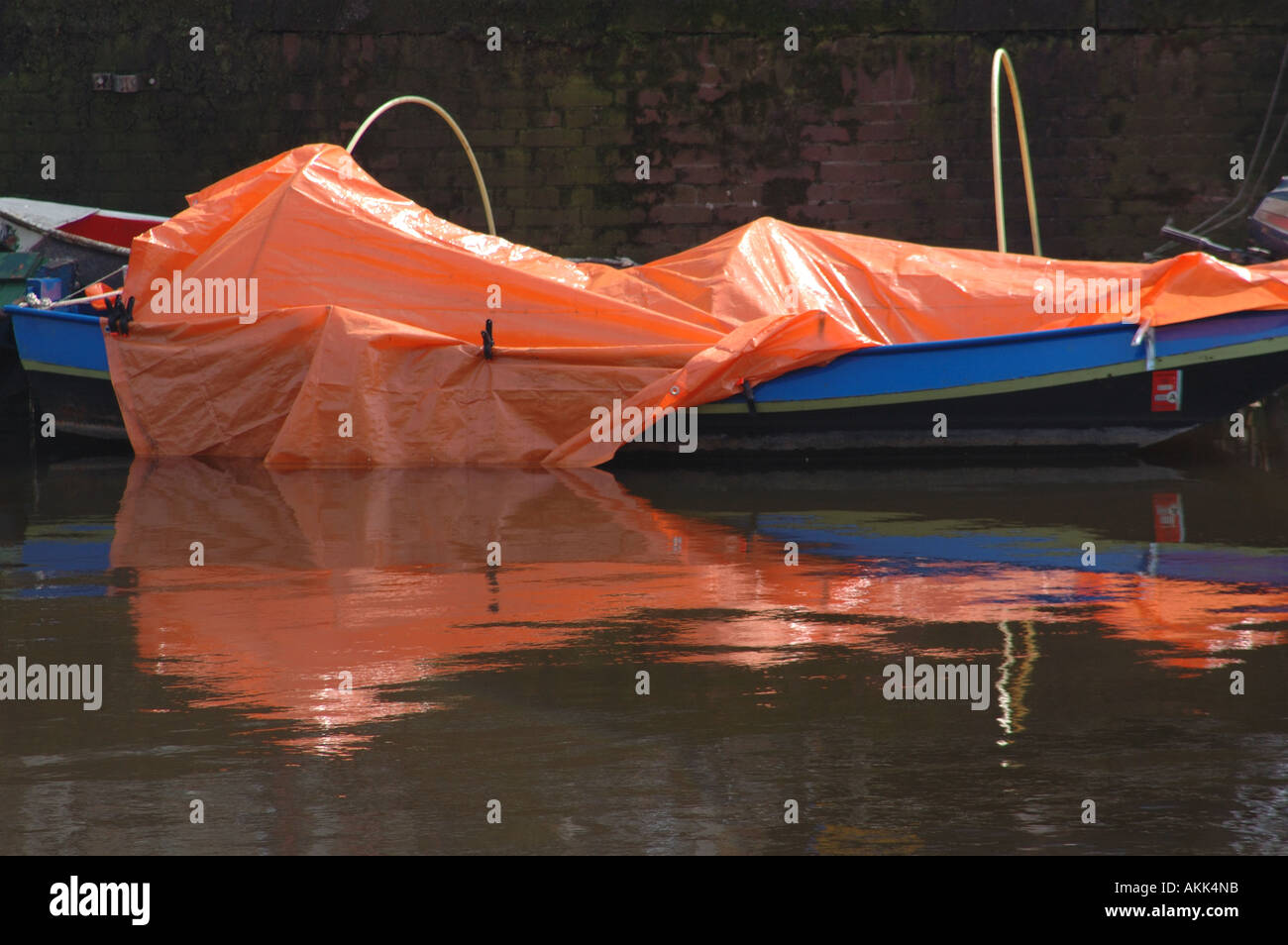 Orange plastic boat hi-res stock photography and images - Alamy