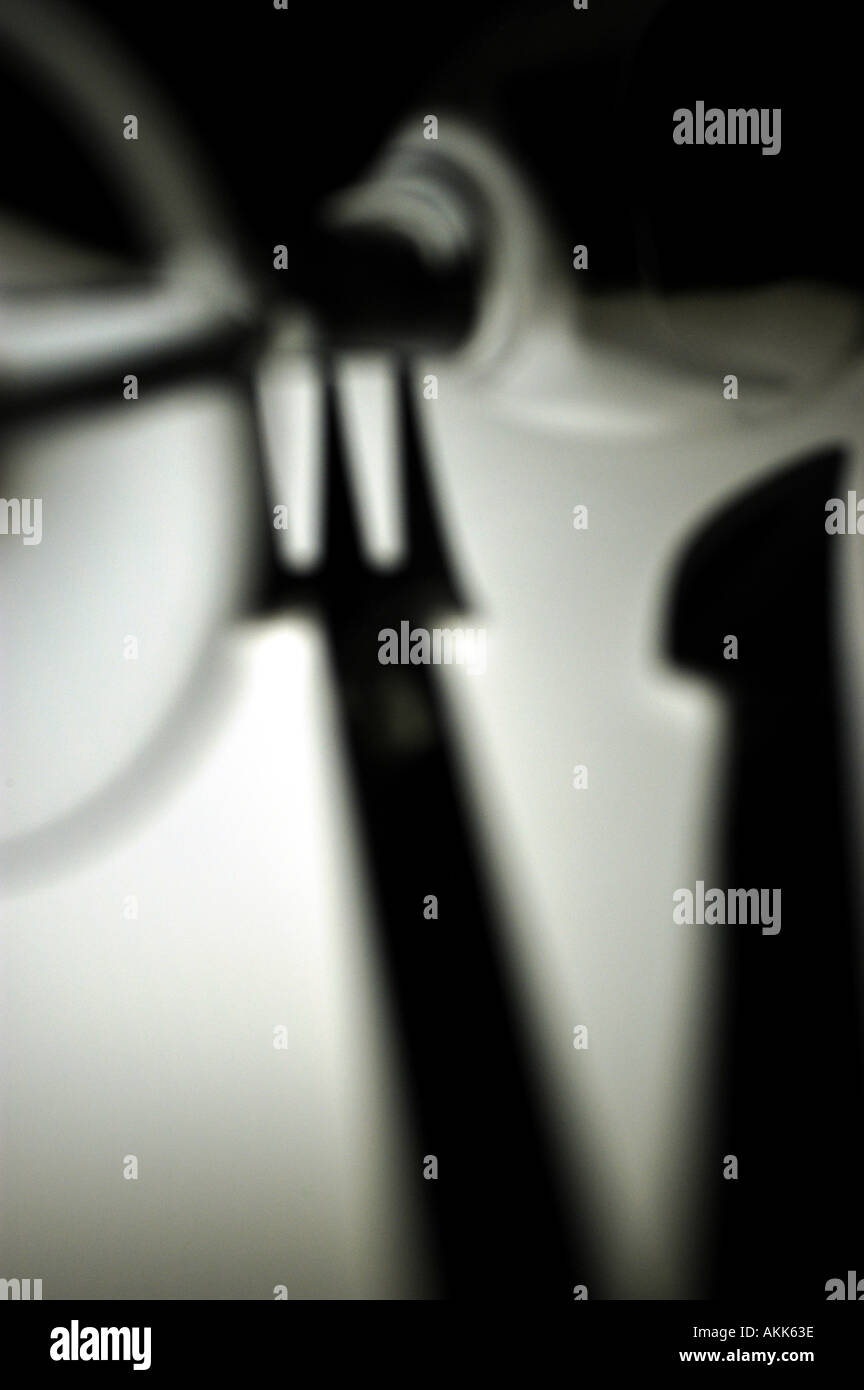 Conceptual Glass Fork and Knife Stock Photo - Alamy