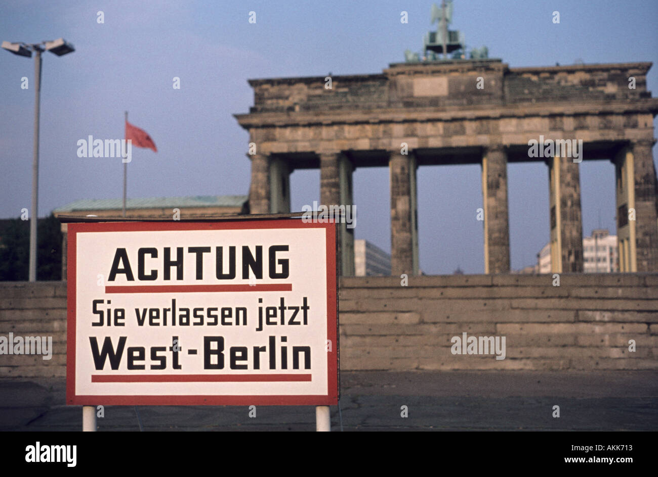 warning sign at Berlin Wall and Brandenburger Gate 1960s or 1970s ...