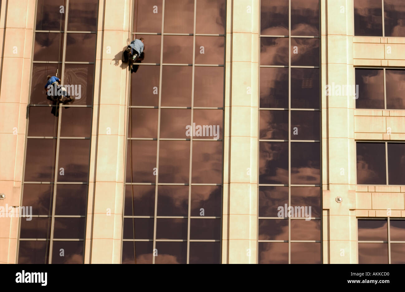 Window washers on a high rise building Stock Photo - Alamy