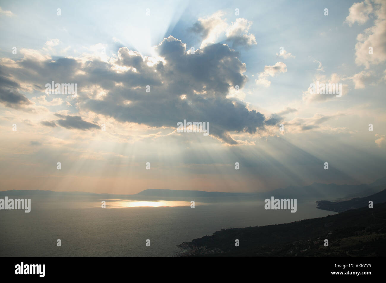 Croatia, Sun Hidden behind Clouds Stock Photo - Alamy