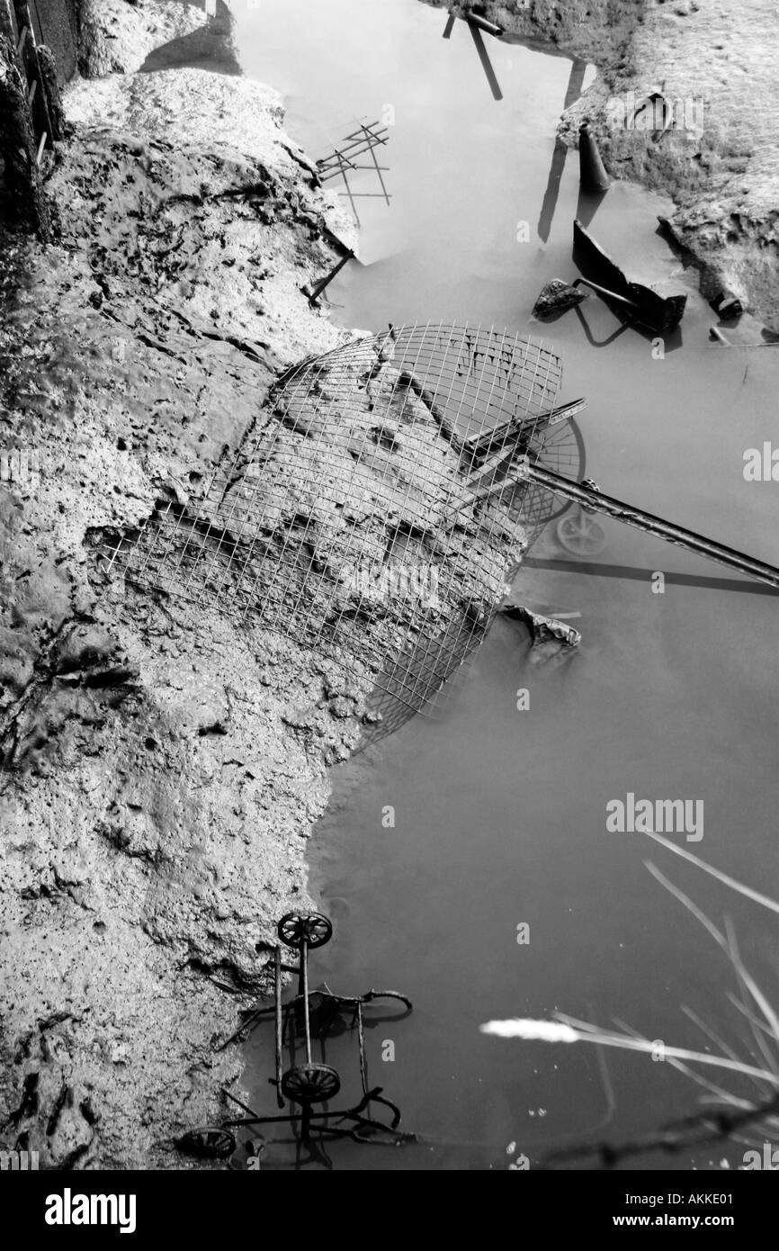 Dumping waste in river Black and White Stock Photos & Images - Alamy