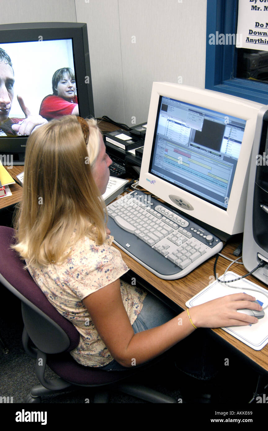 High School female works on computer in graphic artist class Stock ...