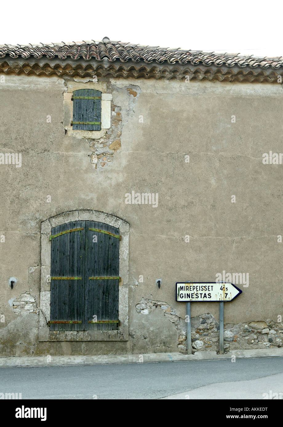 traditional French building with two doors and a characteristic ...