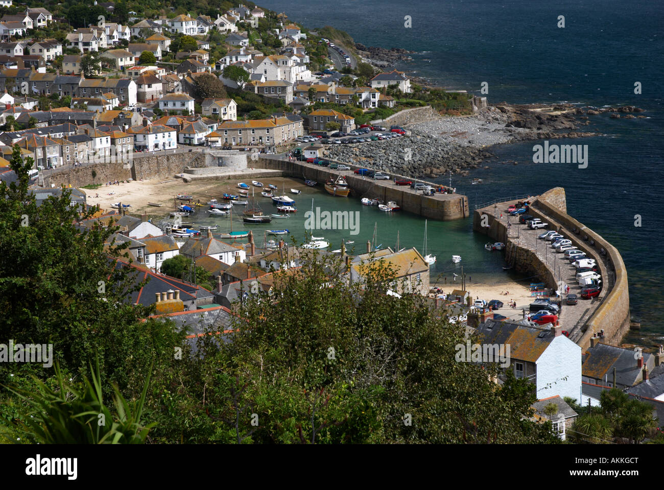 The picturesque and pretty fishing village of Mousehole in Cornwall ...