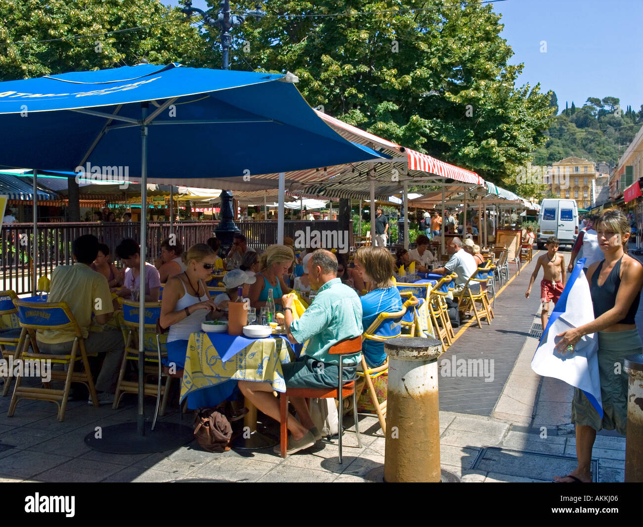 Open air cafe in the marche des fleurs in the old town in Nice on the ...