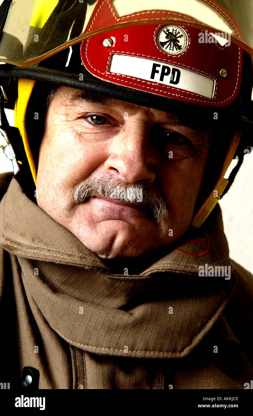 Fireman in uniform Stock Photo - Alamy