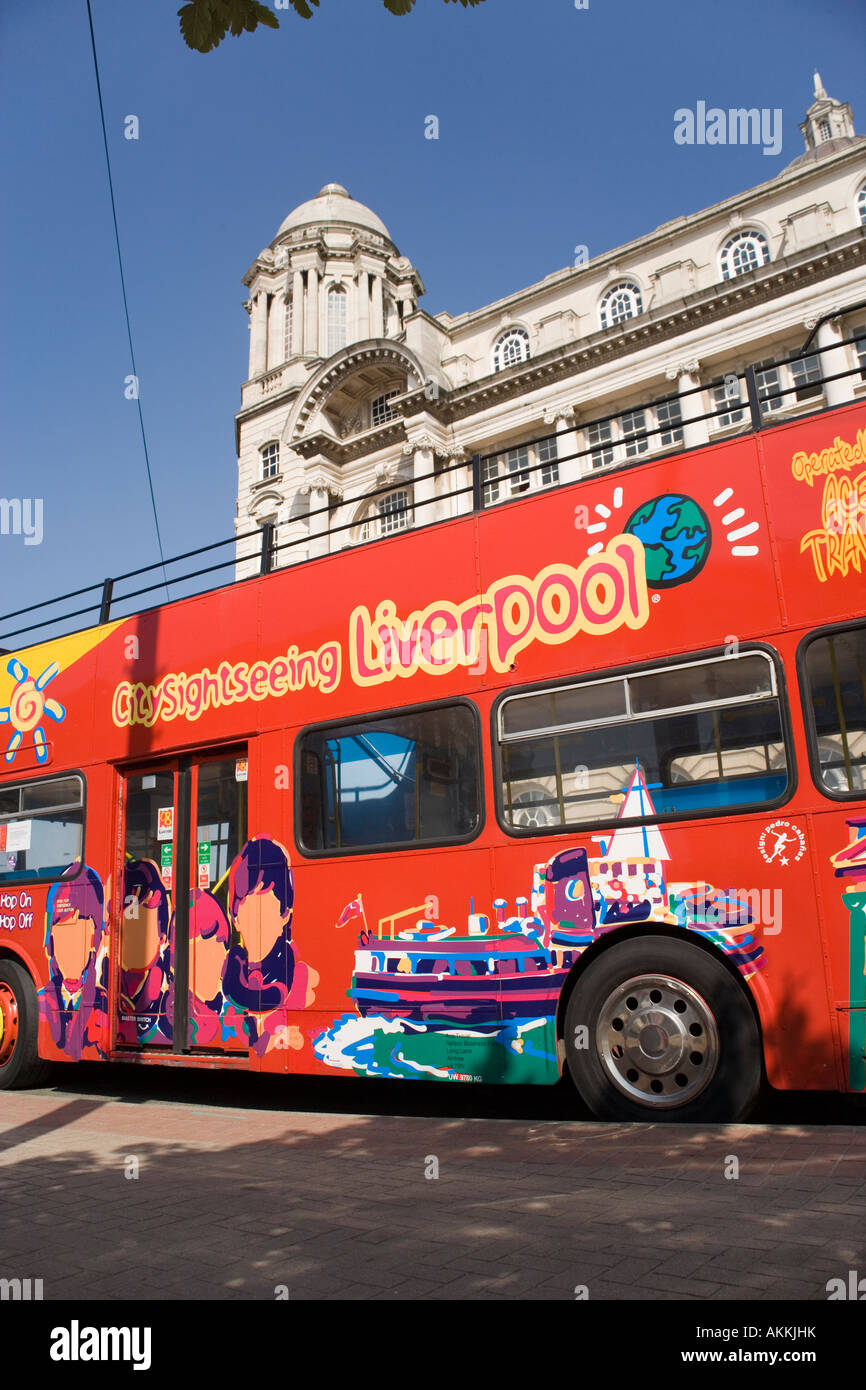 Tourist double deck open top bus with the Port of Liverpool Building ...