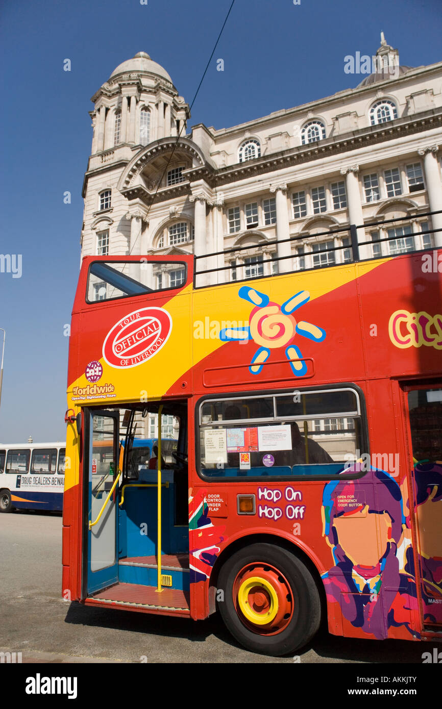 Tourist double deck open top bus with the Port of Liverpool Building ...