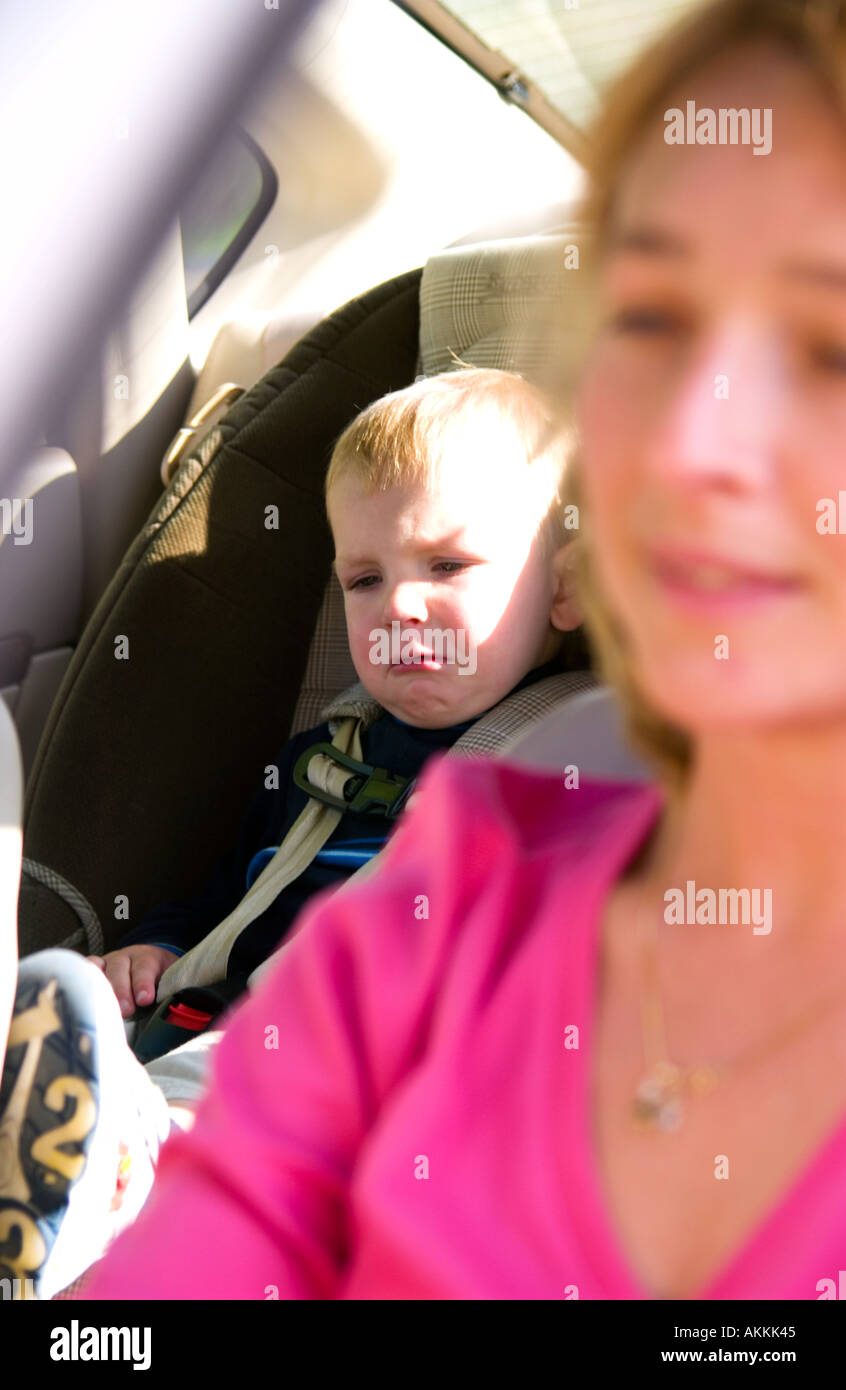 Child crying car seat hi-res stock photography and images - Alamy