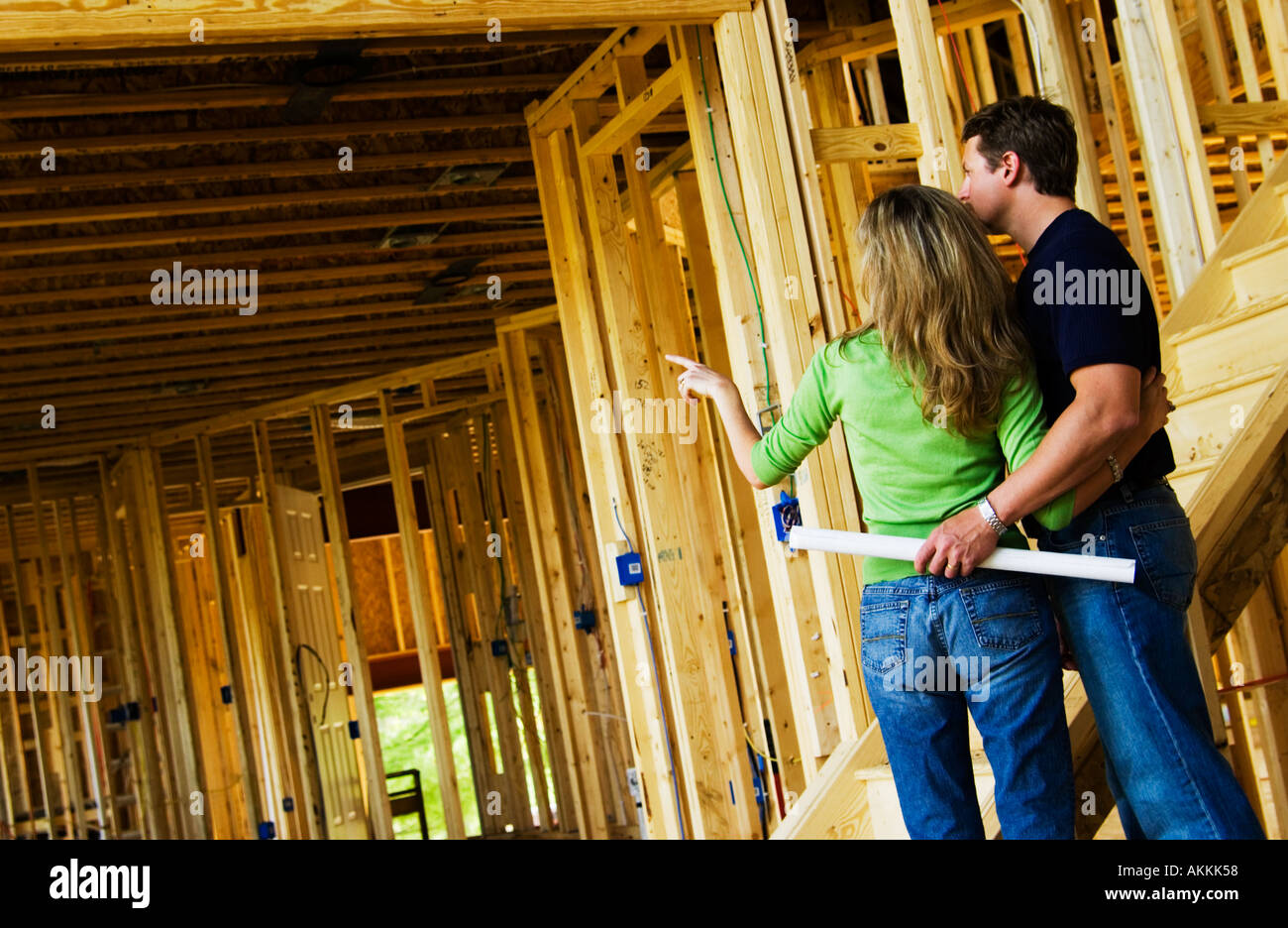 Couple building home Stock Photo - Alamy