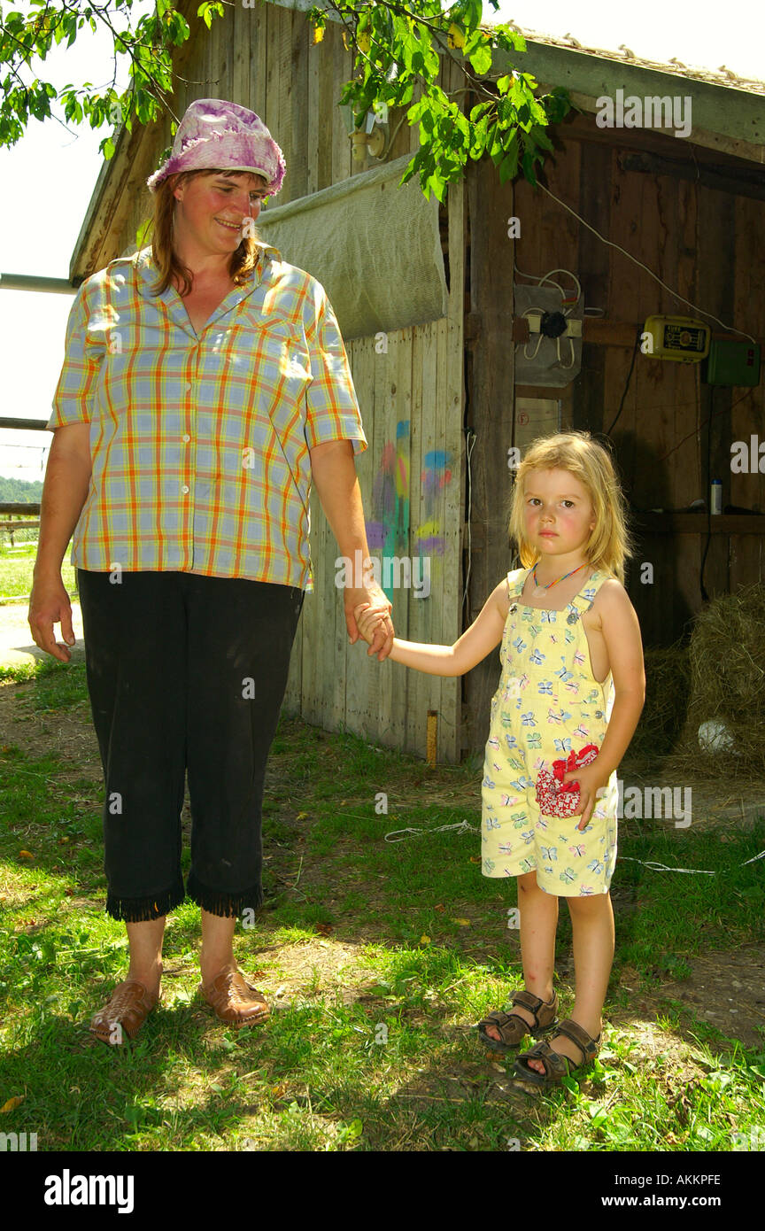 Farmer and her daughter Stock Photo - Alamy