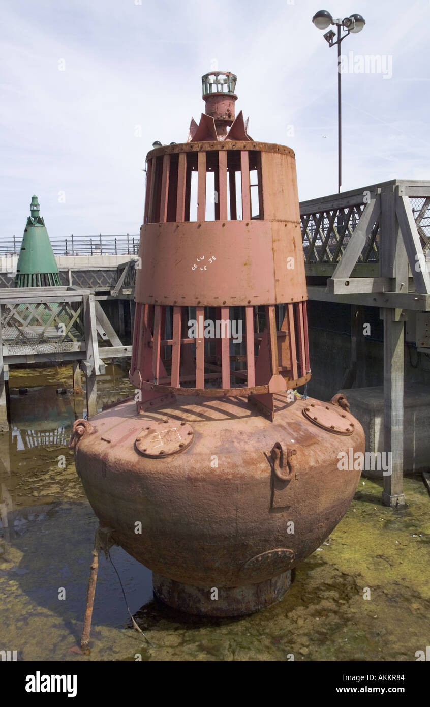 Red Buoy on display on River Mersey on the Woodside Birkenhead bank ...
