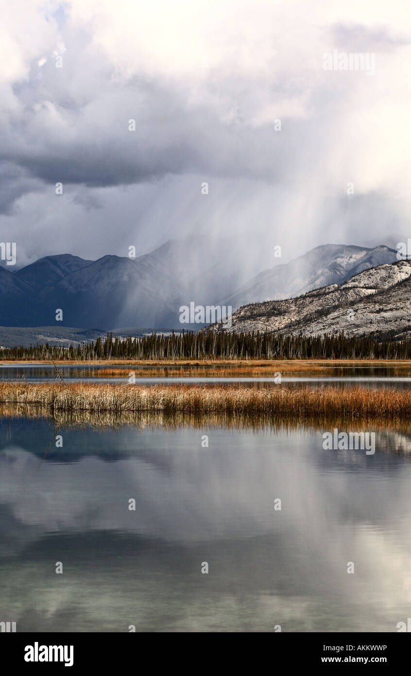 Snow clouds over mountains in scenic Alberta Stock Photo - Alamy
