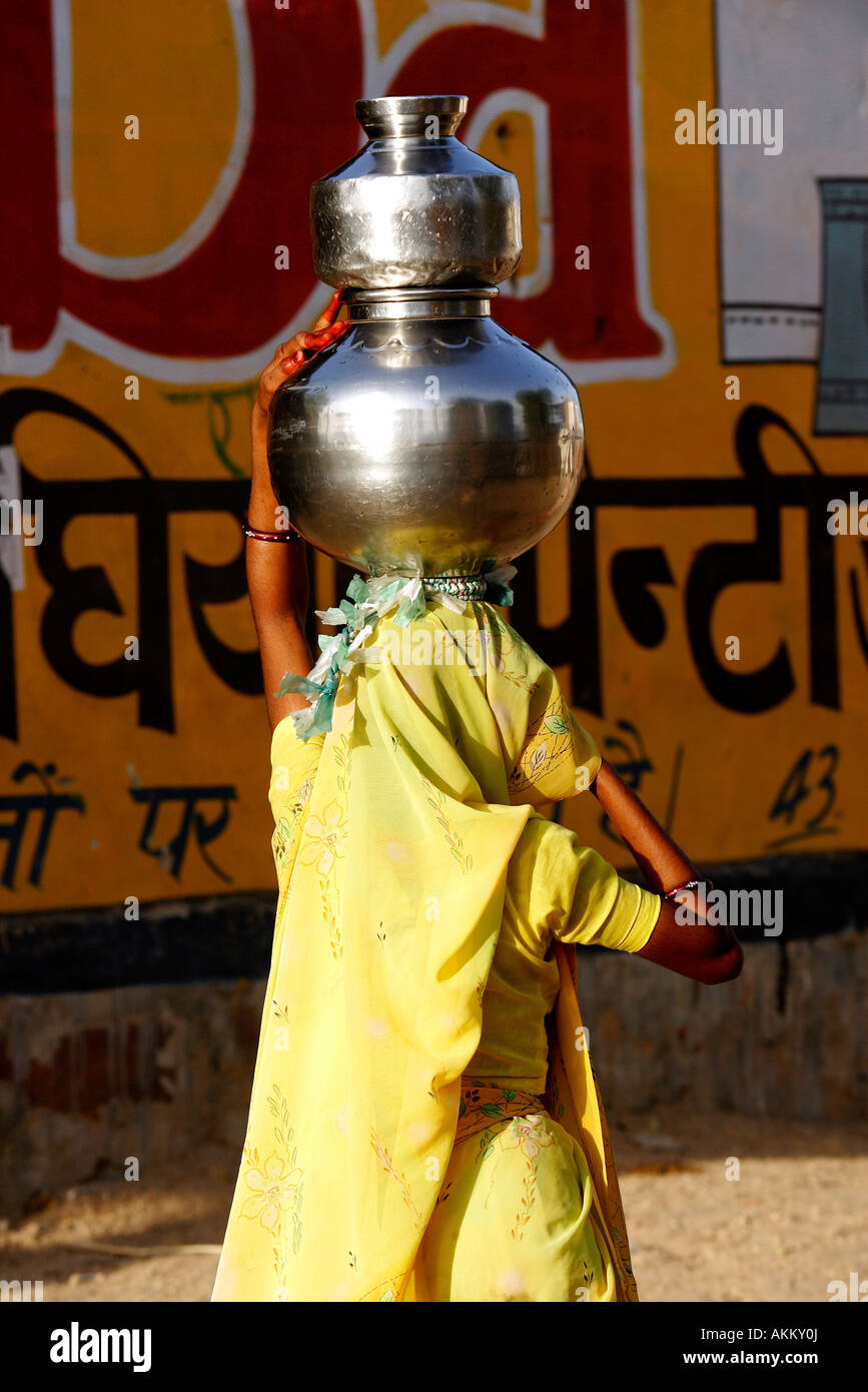 India, Rajasthan, woman carrying water jars Stock Photo - Alamy