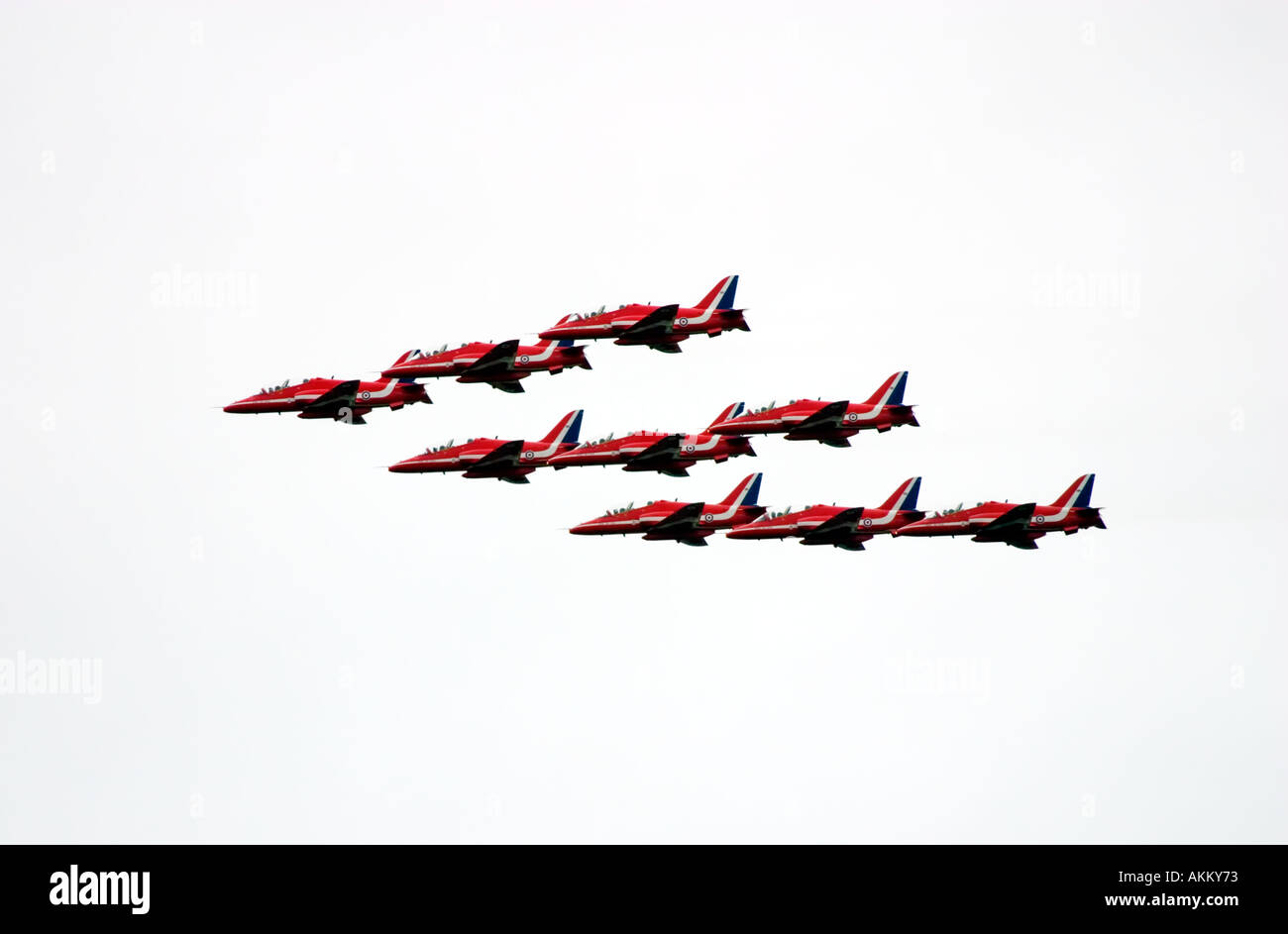 RAF Red Arrows BAE Hawk jet trainer aircraft flying in close formation ...