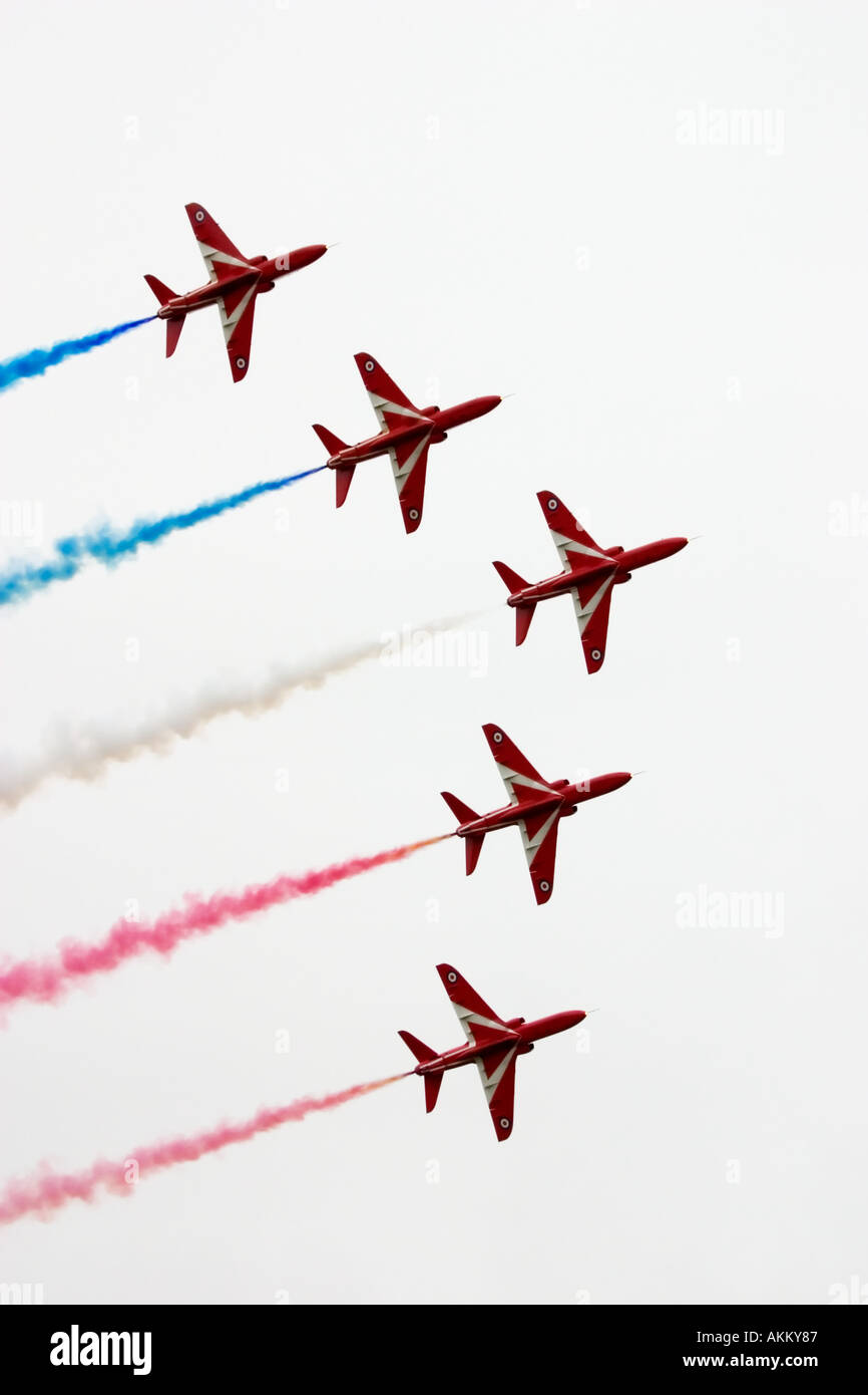 RAF Red Arrows BAE Hawk jet trainer aircraft flying in Enid formation ...