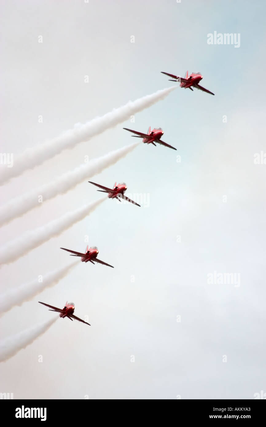 RAF Red Arrows BAE Hawk jet trainer aircraft flying in formation ...