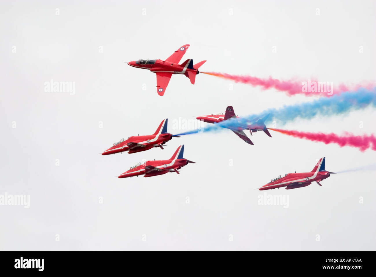RAF Red Arrows BAE Hawk jet trainer aircraft break from close formation ...