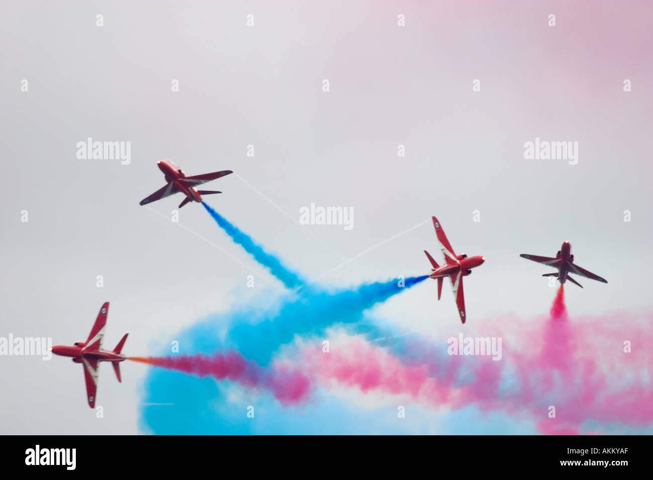 RAF Red Arrows BAE Hawk jet trainer aircraft break from close formation ...