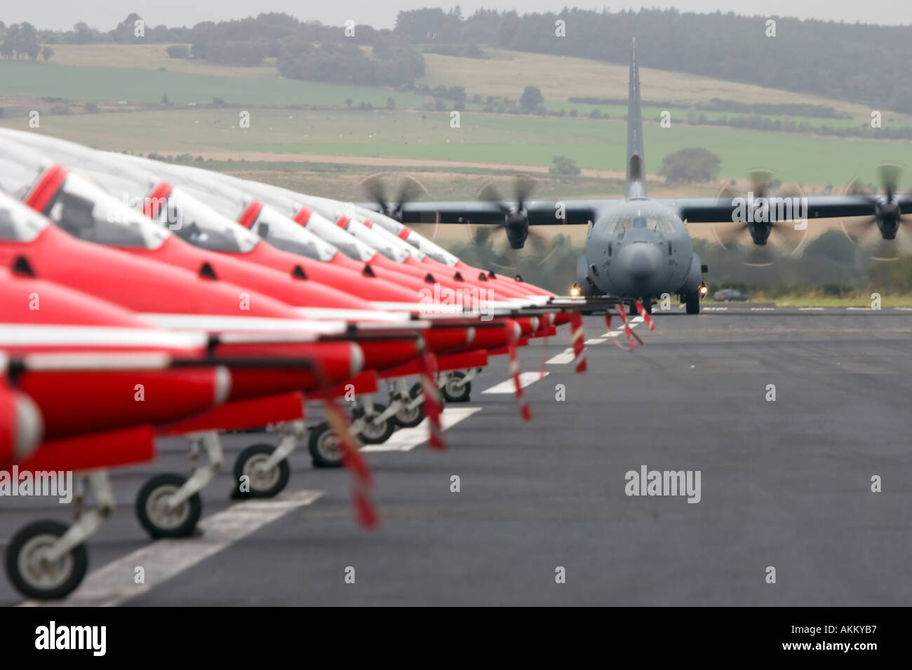 RAF Red Arrows BAE Hawk jet trainer aircraft lined up on runway with ...