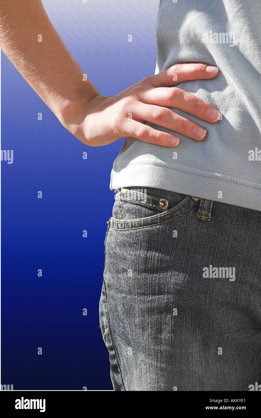 lady standing with hand on her hip Stock Photo - Alamy