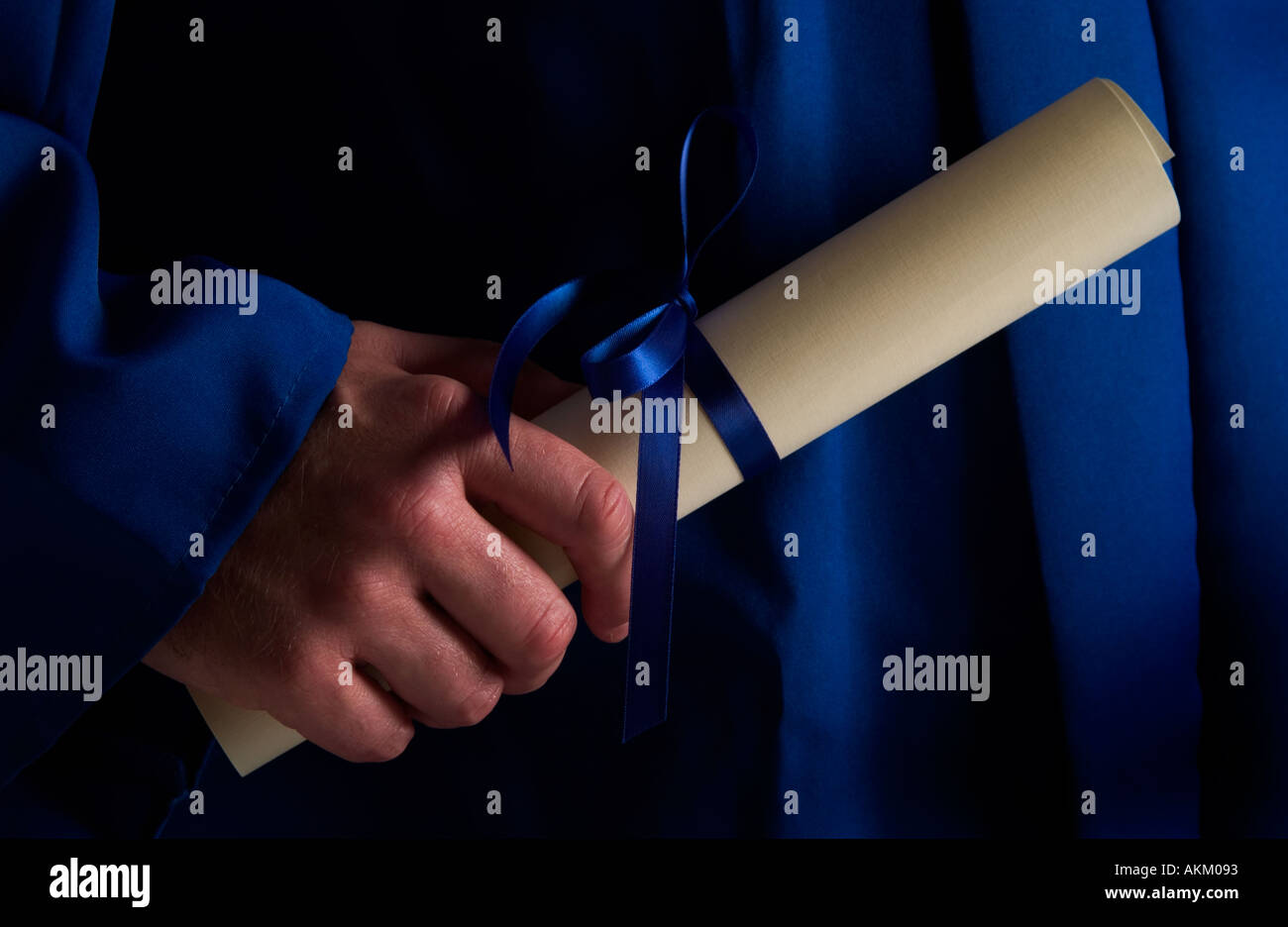 Teen graduate holding diploma hi-res stock photography and images - Alamy