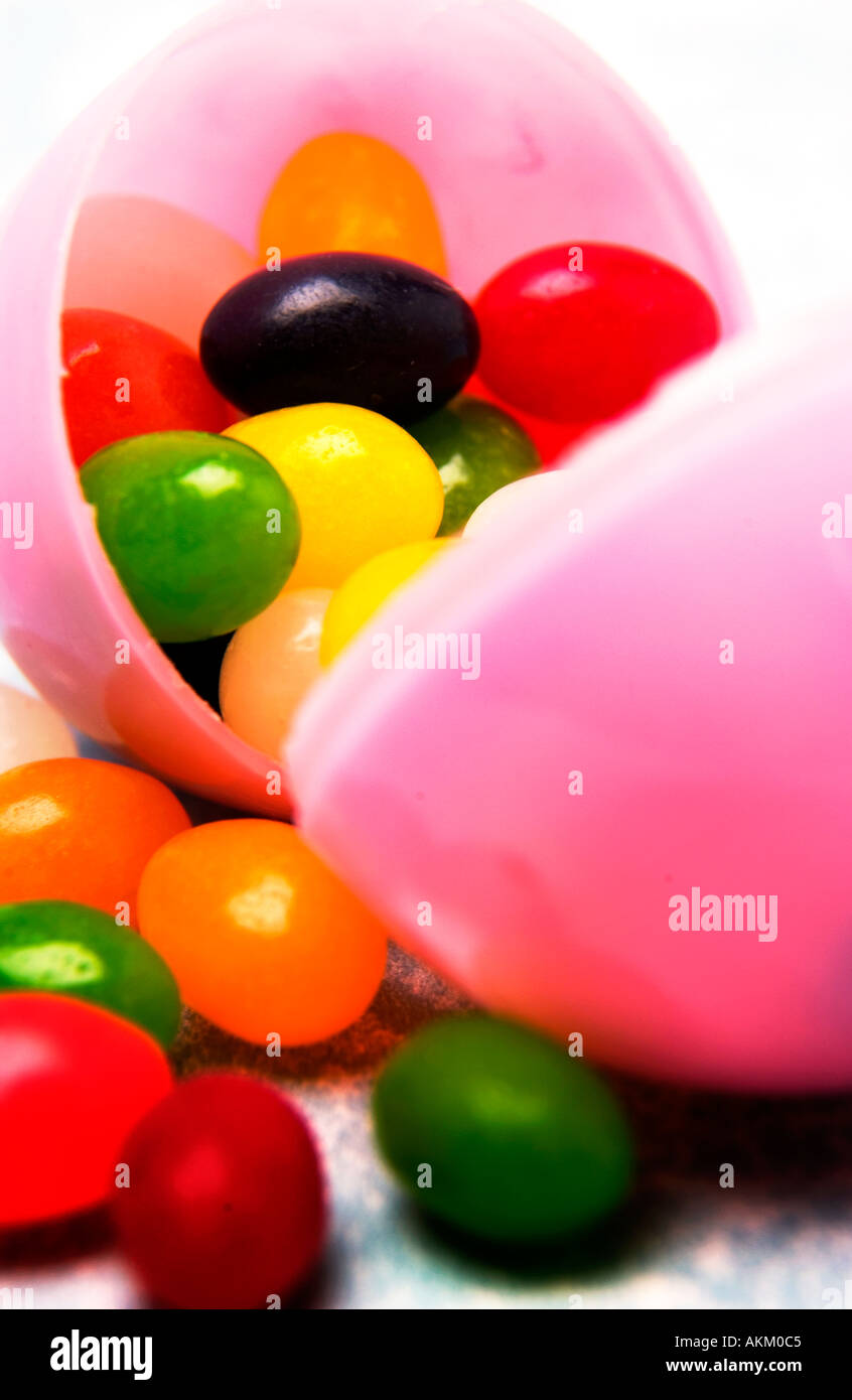 Plastic Easter egg w jelly beans Stock Photo - Alamy