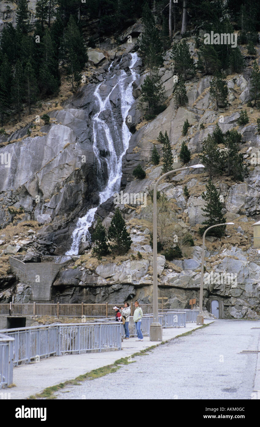 Waterfall at river dam Embassament de Cavallers in Aiguestortes ...