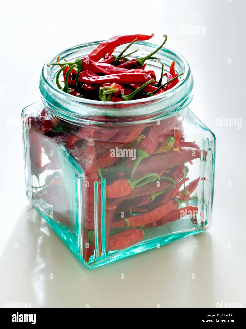 Jar full of red hot Thai Dragon peppers Stock Photo - Alamy