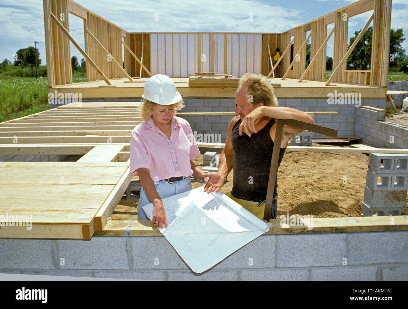 Male contractor discusses home hi-res stock photography and images - Alamy