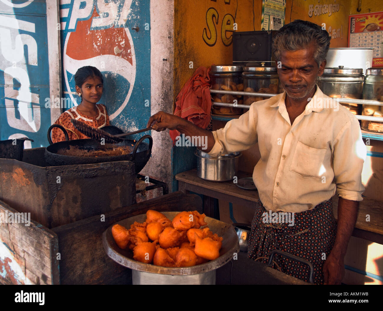 Indian man cooking egg bhaji Deep fried boiled egg Chennai Madras India ...