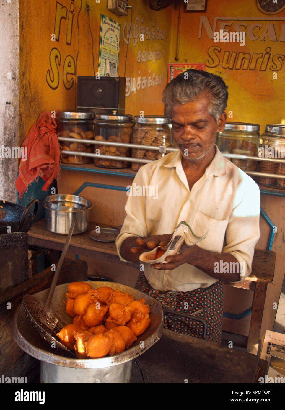 Indian man cooking egg bhaji Deep fried boiled egg Chennai Madras India ...