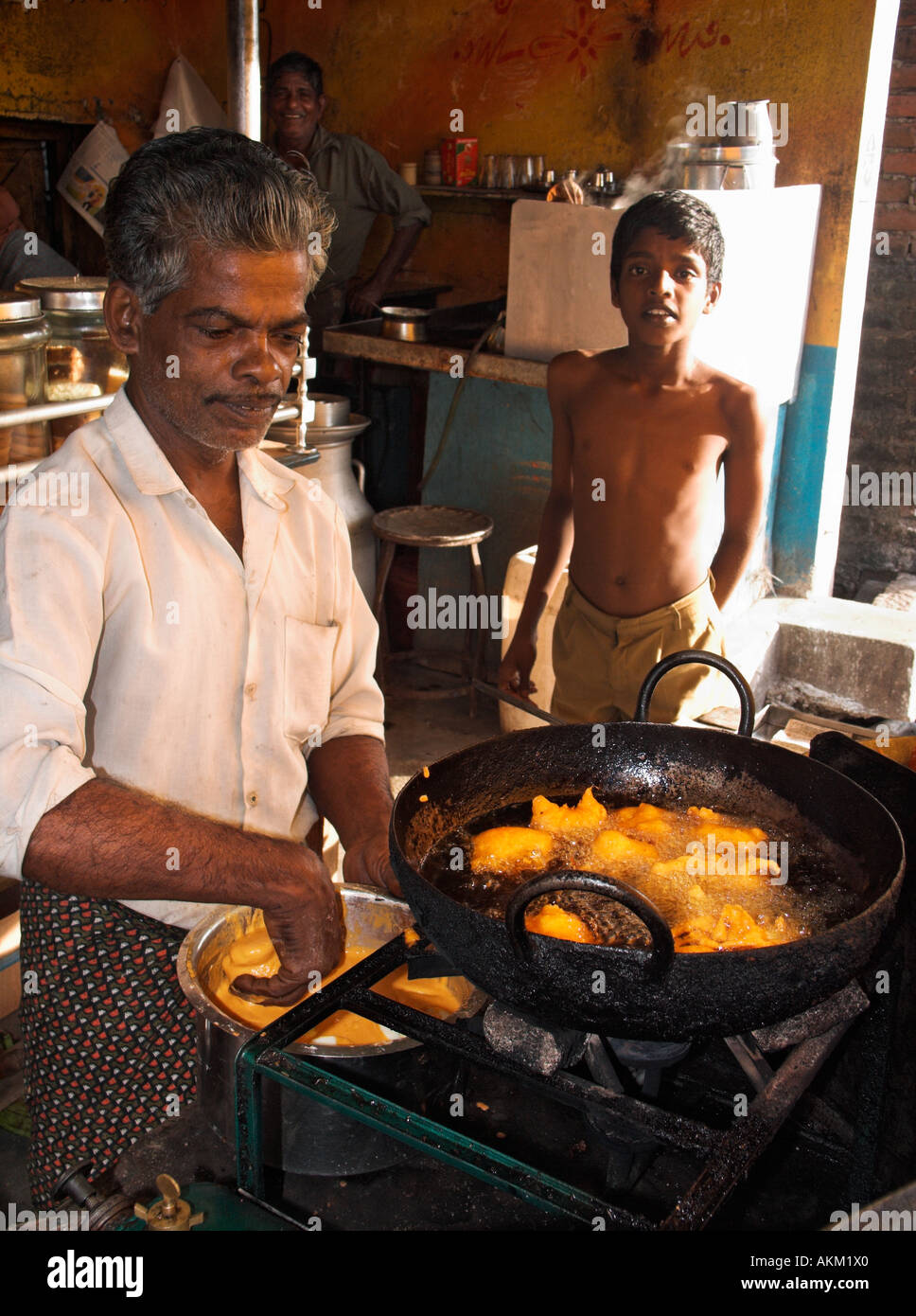Indian man cooking egg bhaji Deep fried boiled egg Chennai Madras India ...
