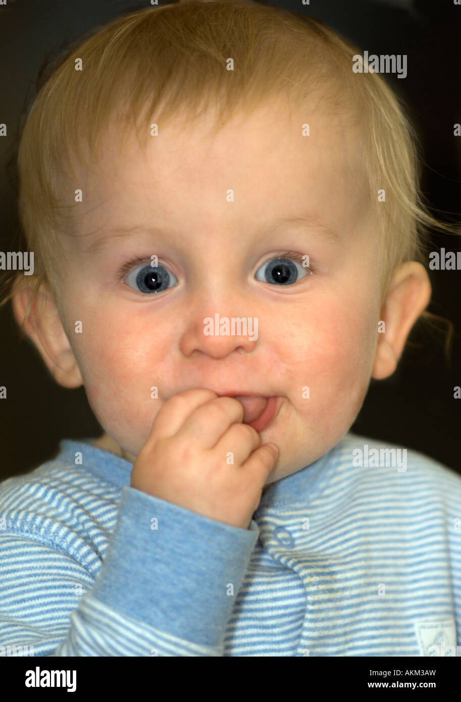 Natural wonder of a blue-eyed young child Stock Photo - Alamy