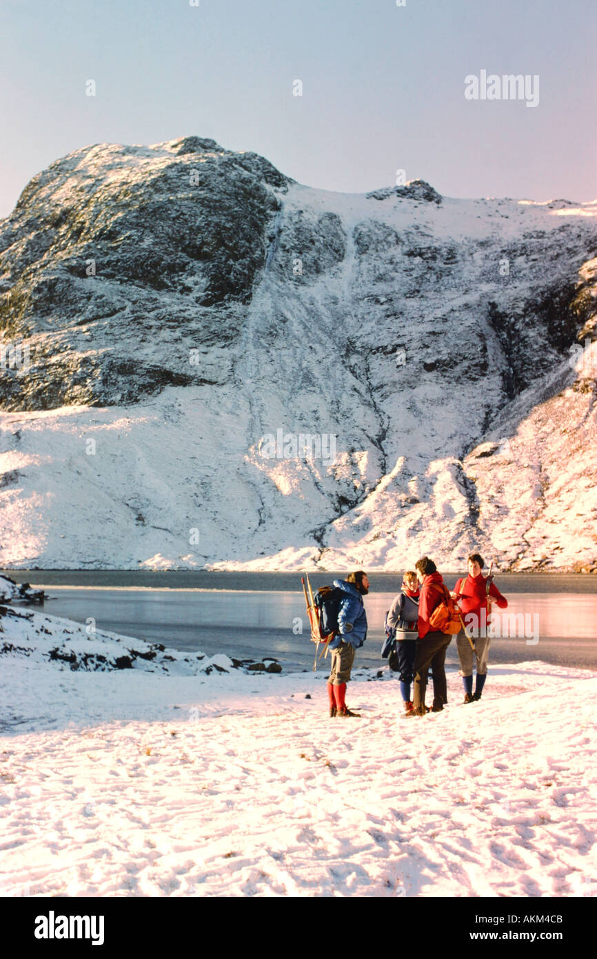 Lake District in winter snow Stickle Tarn Langdale Pikes Cumbria ...