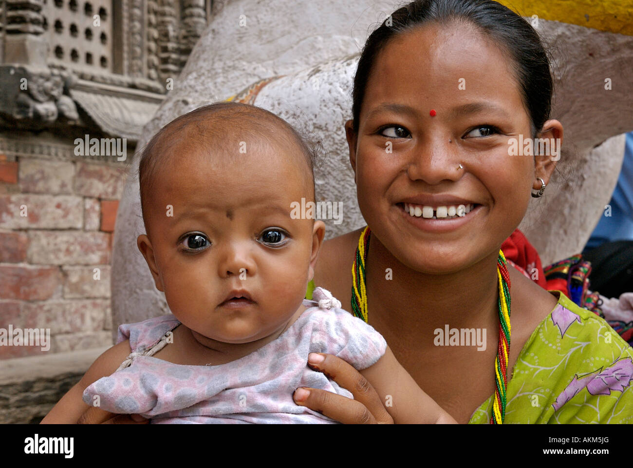 Happy young Nepalese mother with her baby Kathmandu Nepal Stock Photo ...
