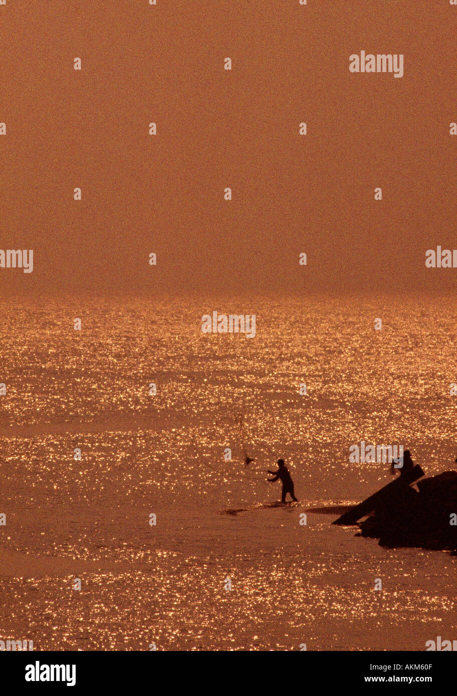 VA Virginia Beach Rudee Inlet Fishermen throwing bait net in early ...