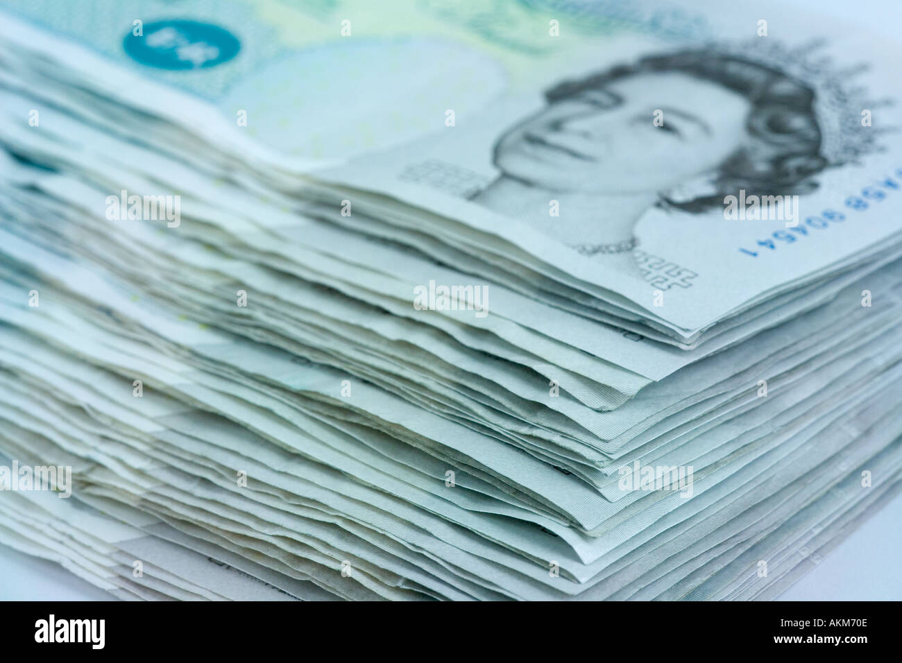 Five pound notes in a pile Stock Photo - Alamy