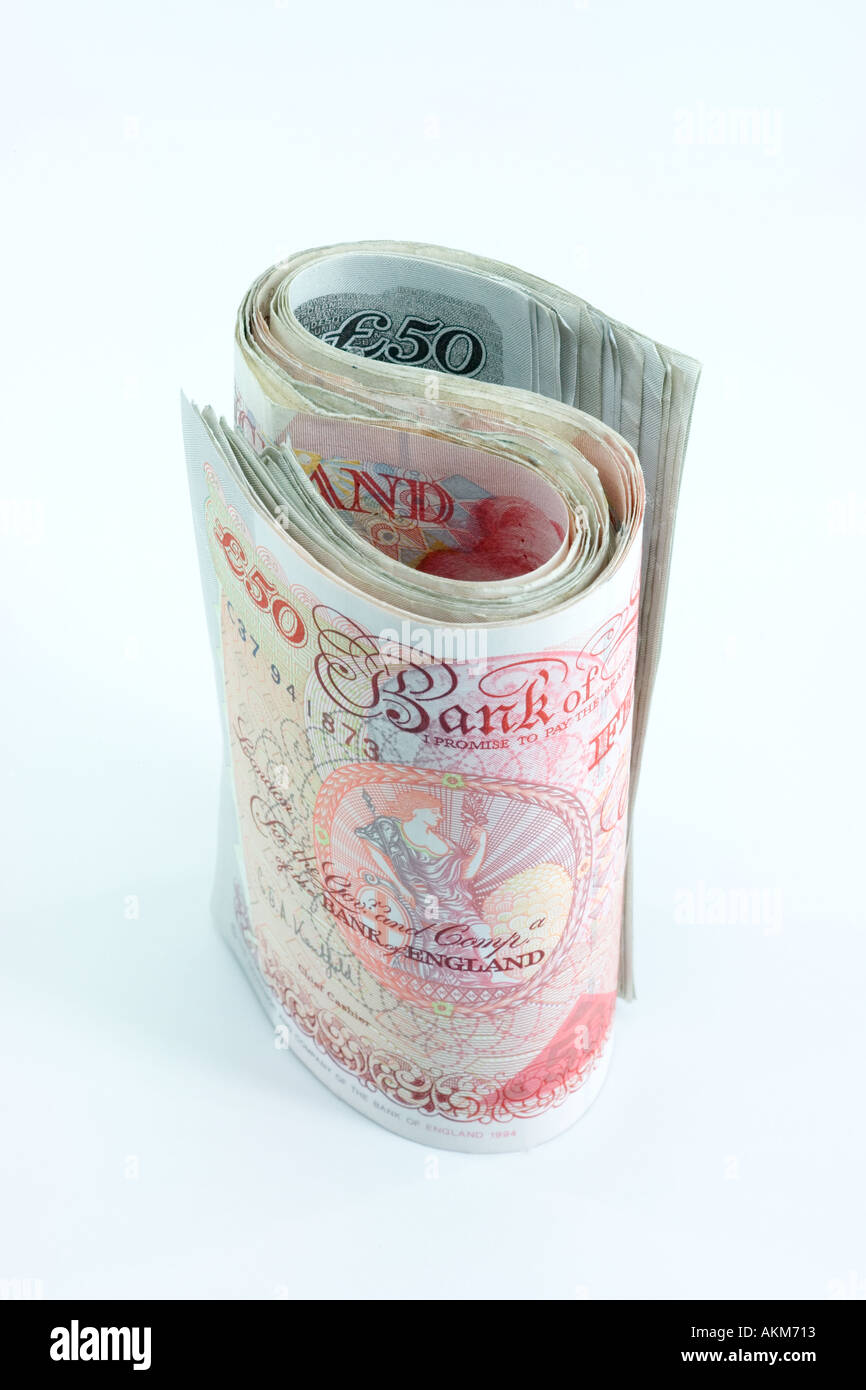 Roll of fifty pound notes Stock Photo - Alamy