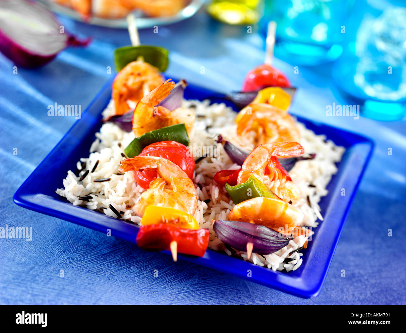 KING PRAWN AND VEGETABLE KEBABS ON A BED OF WILD RICE Stock Photo - Alamy